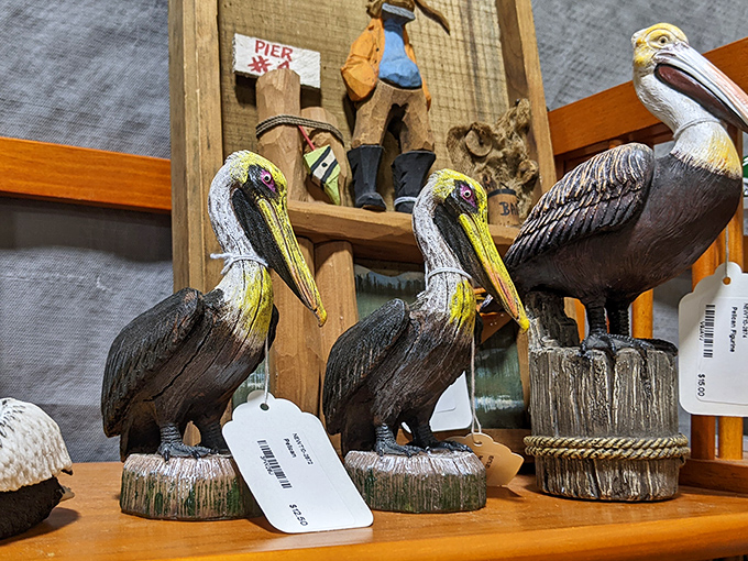 Pelican sculptures stand at attention, ready to migrate to your coastal-themed guest bathroom. Florida décor at its finest.