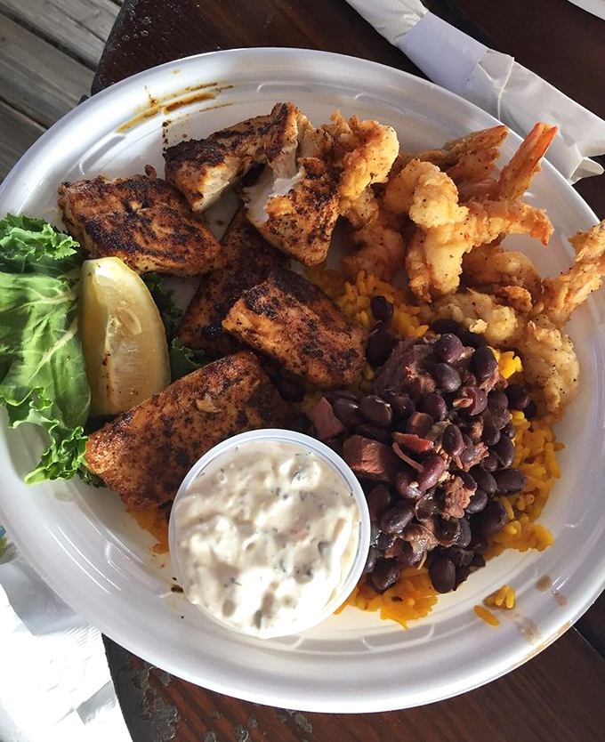 Blackened mahi showcases the kitchen's mastery of spice and fire, creating seafood perfection on every plate.