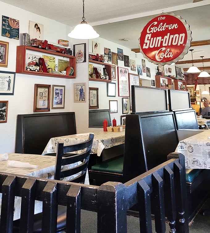 Booths that invite you to slide in and stay awhile. That Sun-drop Cola sign promises refreshment while the memories on the walls provide entertainment.
