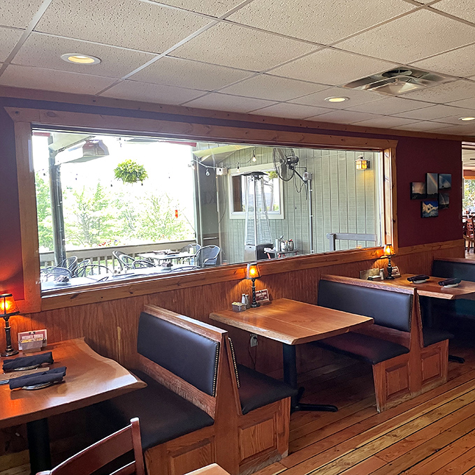 These booths aren't just seating—they're front-row tickets to a meal that makes you forget to check your phone. The large windows invite nature to be part of your dining experience.