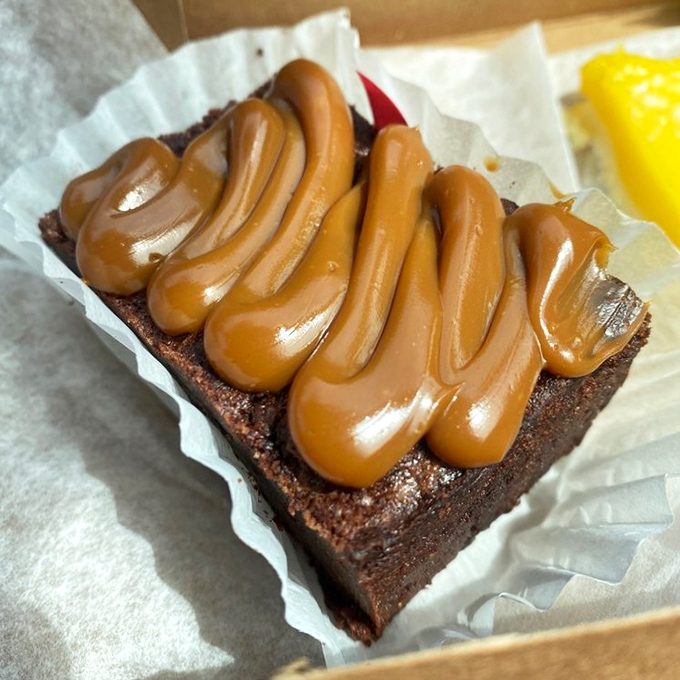 This brownie with its perfect caramel swirl isn't just dessert – it's what chocolate dreams about when chocolate goes to sleep.