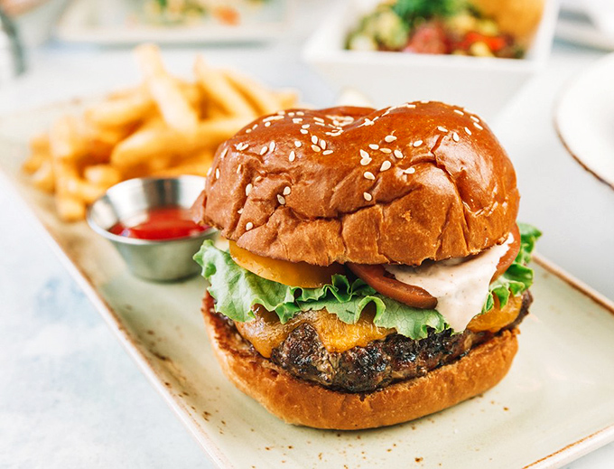 A burger that makes you forget you came for seafood—nestled in a brioche bun with the confidence of something that knows it belongs.