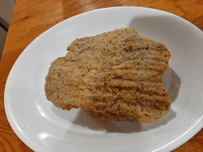 A chicken fried steak that doesn't know the meaning of "portion control." That golden-brown crust is what dreams are made of.