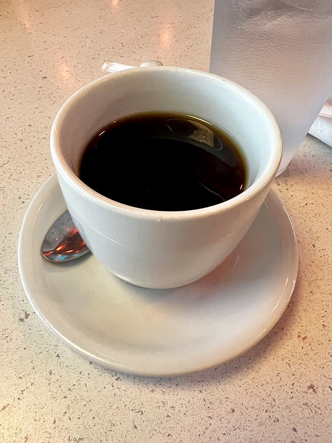 A simple cup of diner coffee—the unsung hero of American cuisine. Dark, honest, and ready to fuel your day without any fancy foam art.