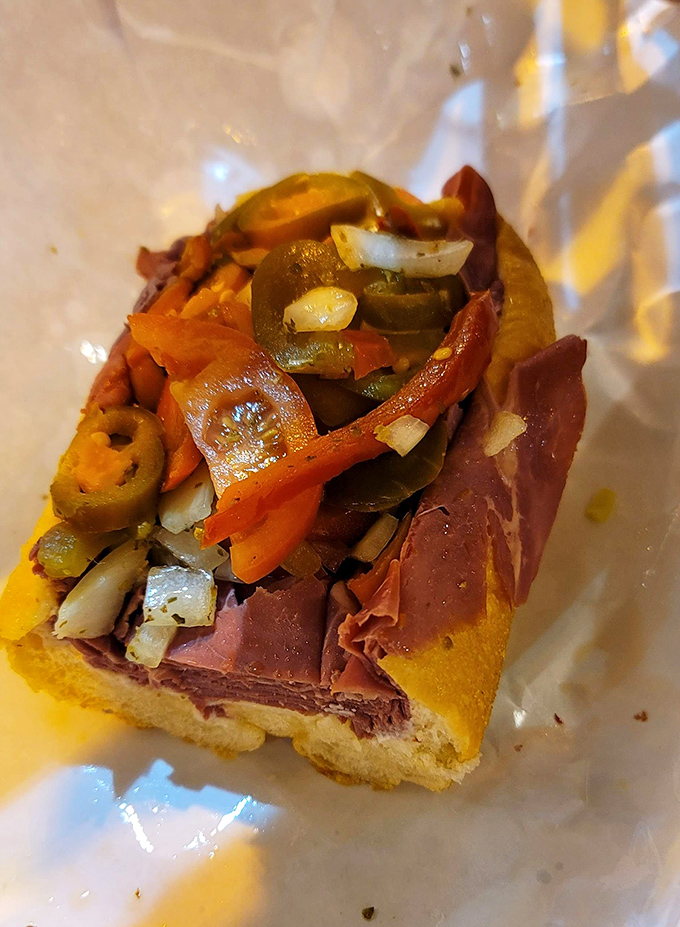 Those vibrant jalapeños aren't just for show—they're the exclamation points in this sandwich's flavor story. A masterpiece of heat and meat.