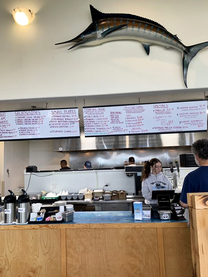Where the magic happens—a counter topped by a marlin that seems to be saying, "Trust me, I know good fish when I see it."