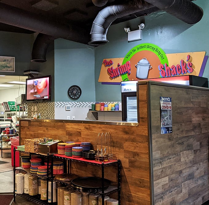 Where seafood magic happens. The wooden counter and colorful plates stand ready for the next batch of ocean-fresh delights.
