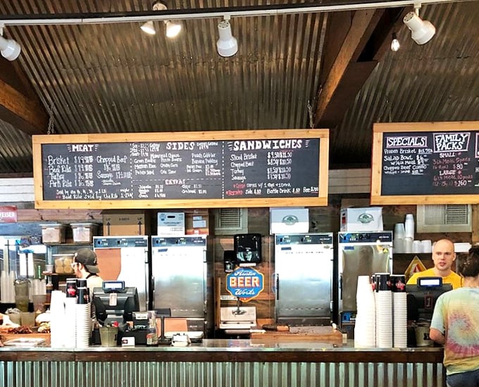 The ordering counter—where dreams come true and diets go to die. Choose wisely, though there's really no wrong answer when everything's smoked to perfection.