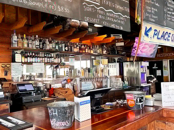 The bar area—where local brews flow freely and the staff knows exactly what you need after a long day of beach combing.