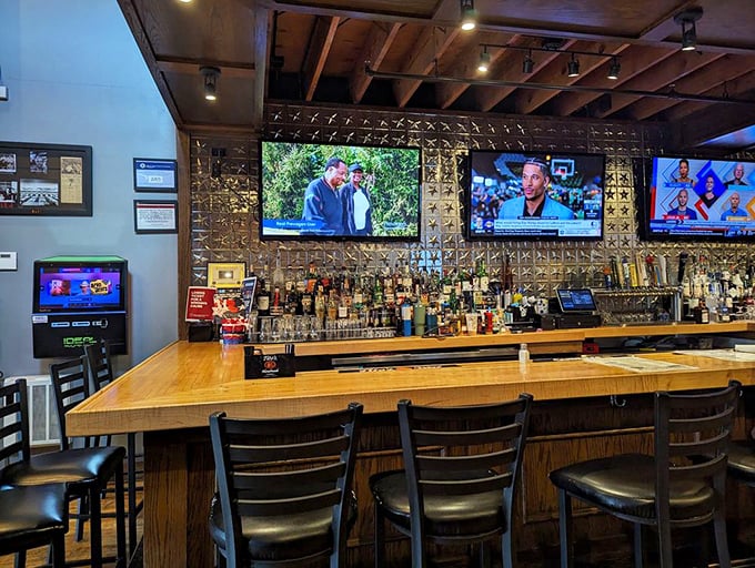 A bar backed with enough bottles to make your indecisive friend have a minor breakdown. Those screens ensure you never miss a game while savoring your meal.