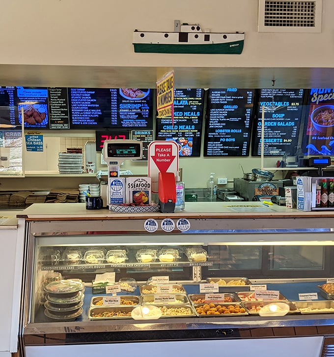 Where the magic happens—part seafood counter, part ordering station. The glass case displays tomorrow's dinner waiting for today's decision makers.