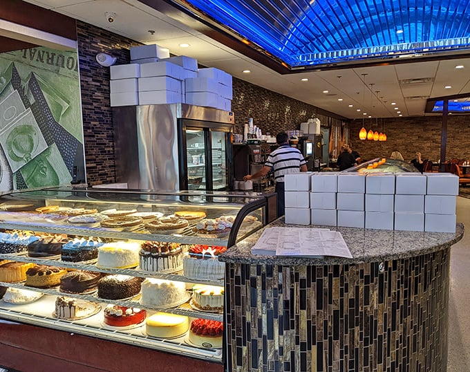 The dessert case—where willpower goes to die and "I'll just have coffee" turns into "and a slice of that chocolate cake, please."