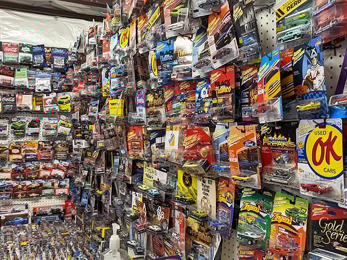Hot Wheels heaven! This wall of miniature automotive history represents thousands of childhood racing dreams preserved in die-cast metal and rubber tires.