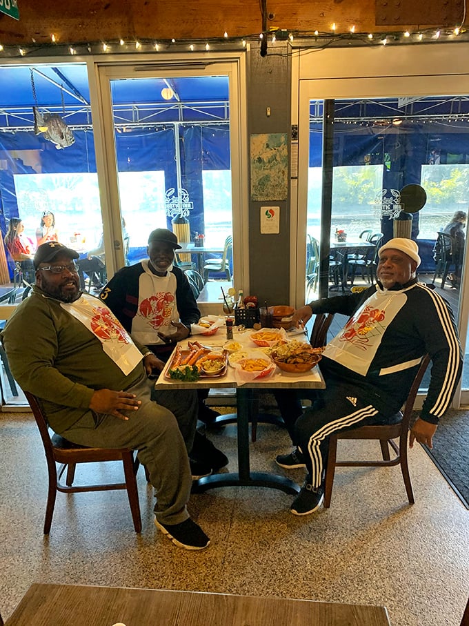 These gentlemen know the universal truth: bibs aren't optional, they're essential armor in the delicious battle against garlic butter splatter.