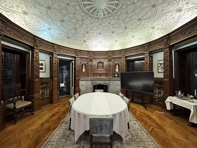 The dining room's ornate ceiling and wood paneling create an atmosphere where you'd expect to discuss railroad stocks rather than school district matters.