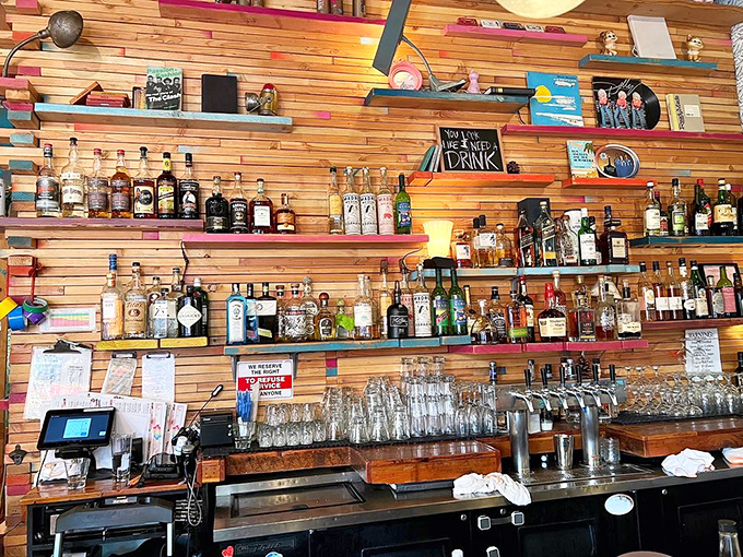 The bar shelves tell a story of liquid possibilities – from craft beers to cocktail ingredients waiting to complement your döner experience.