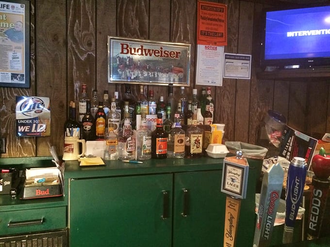 The bar setup isn't trying to impress with exotic spirits – it's stocked with exactly what you want for washing down that legendary cheesesteak.