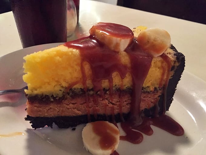 This isn't just dessert—it's edible art. Layers of decadence topped with caramel and bananas that would make Elvis himself swivel with delight.