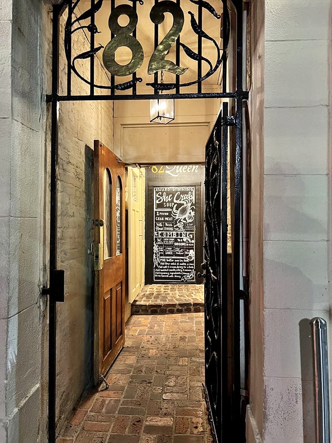 Through the wrought iron gate, past cobblestones worn smooth by centuries of footsteps—82 Queen beckons with promises of culinary magic ahead. 