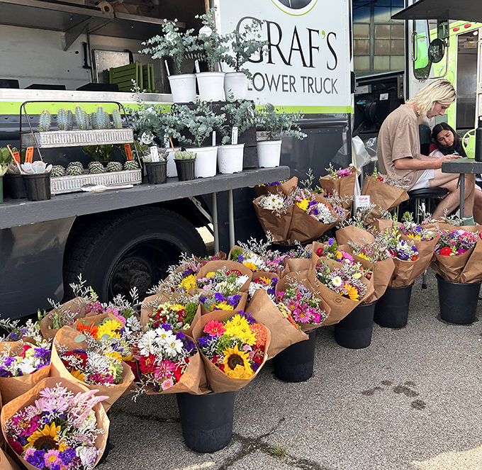 Flower truck blooms bring instant happiness—nature's antidepressants wrapped in brown paper, no prescription necessary.