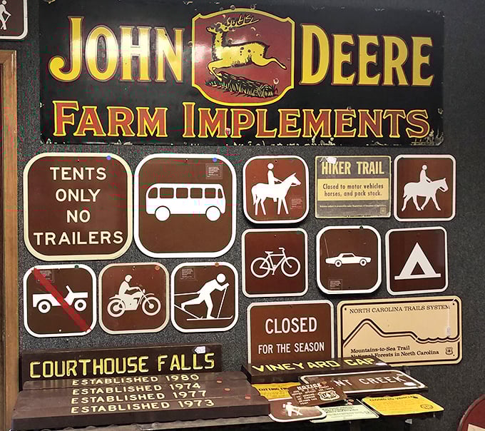 John Deere signs share wall space with park regulations—proof that both farming and recreation have deep roots in Carolina soil.