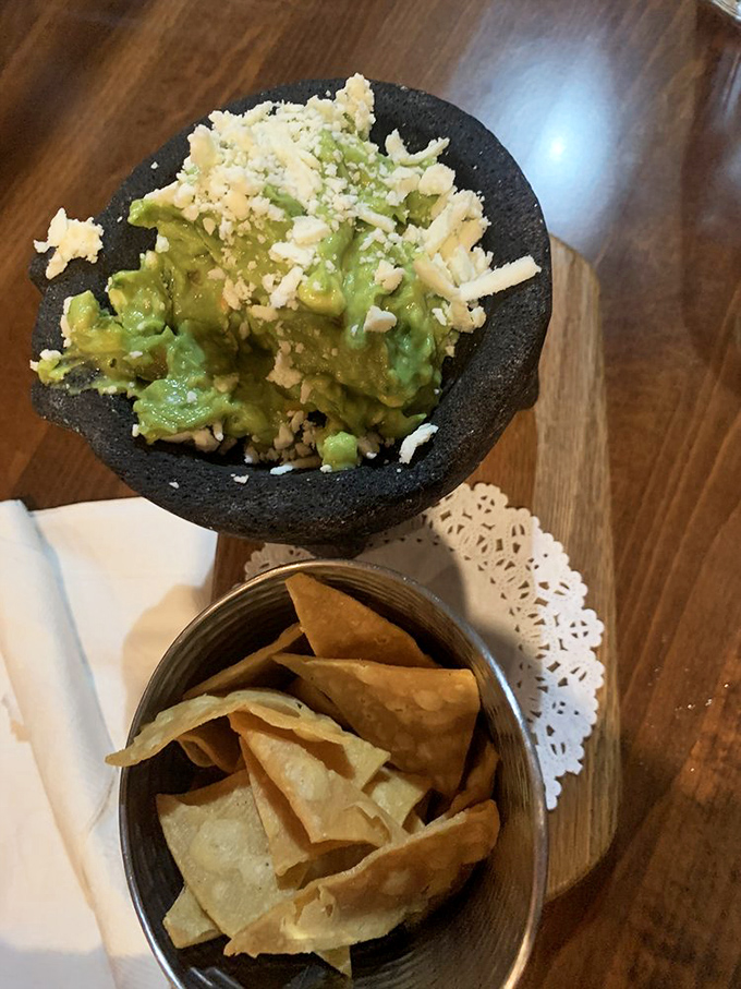 This isn't just guacamole—it's avocado elevated to art form, sprinkled with cotija cheese and served in a traditional molcajete. Chip-dipping nirvana.