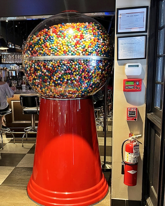 The giant gumball machine—childhood nostalgia supersized. I'd like to think this is what Willy Wonka would have in his waiting room.