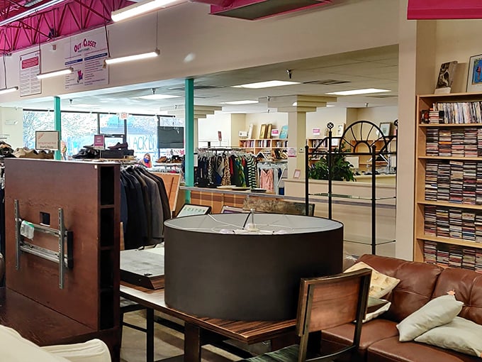 The pharmacy sign reminds shoppers of the store's healthcare mission. Your vintage shirt purchase helps fund HIV services – retail therapy that actually provides therapy.