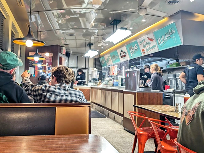 The counter seating isn't just practical—it's where you get a front-row view of the culinary choreography that makes this place legendary.