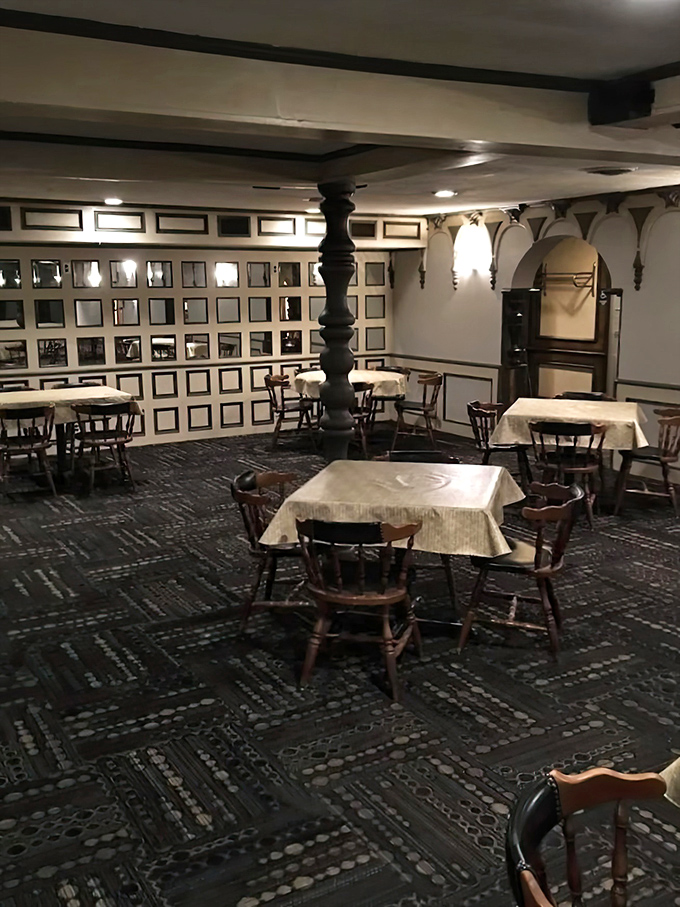 Another angle reveals the cozy atmosphere where strangers become friends over shared barbecue appreciation and stories.