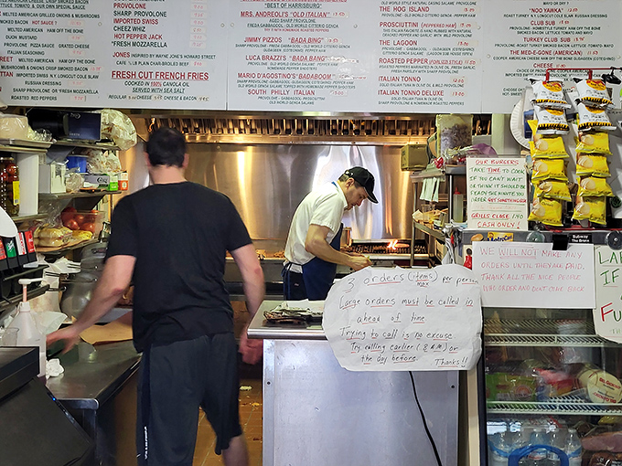 Behind the counter, sandwich artists work their magic with practiced efficiency – no wasted movements in this culinary choreography.