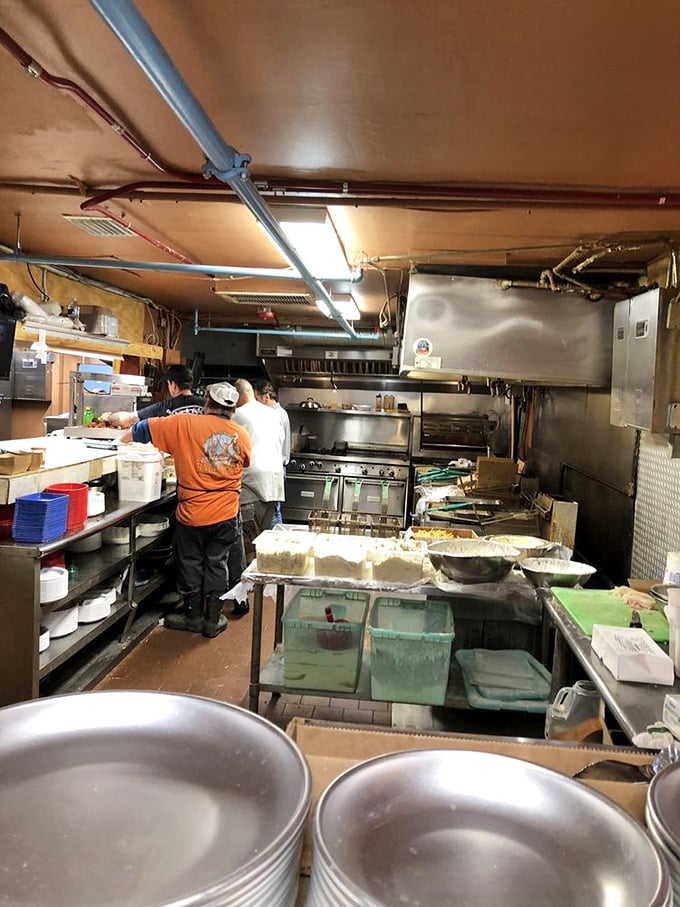 The kitchen where seafood magic happens. No fancy equipment needed—just decades of know-how and the freshest catch from local waters.