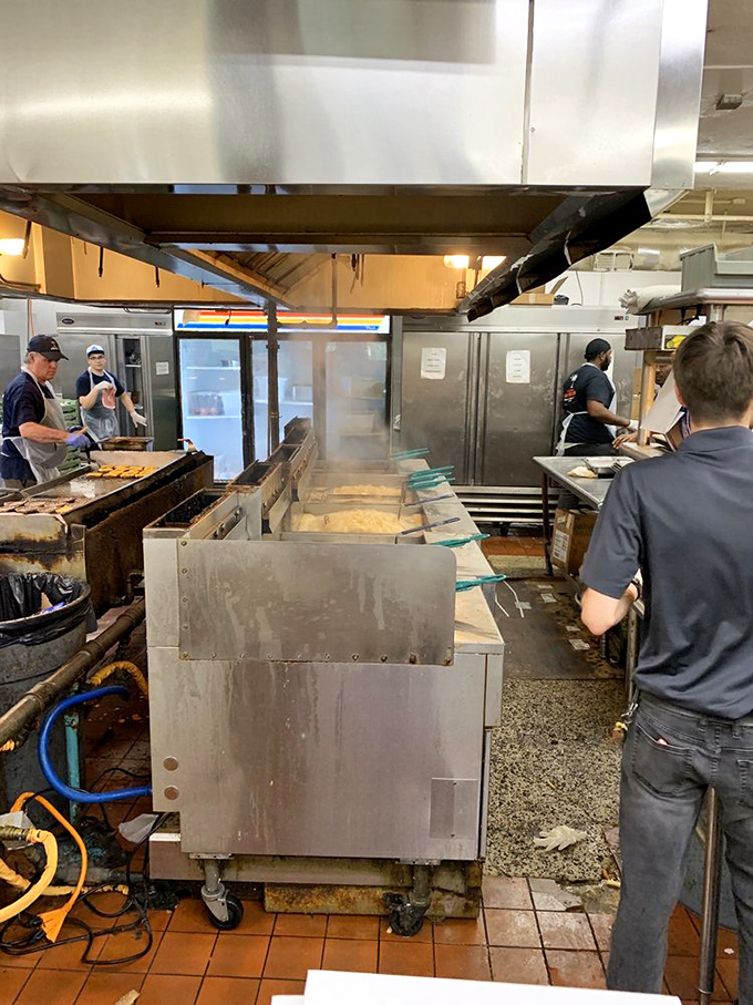 The kitchen's organized chaos reveals the secret behind The Beacon's consistency—a well-choreographed dance of spatulas, grills, and Southern know-how.
