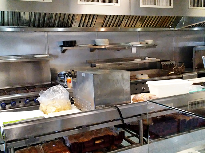 A glimpse into the kitchen where culinary magic happens without fanfare. No molecular gastronomy here—just generations of know-how and well-seasoned equipment.