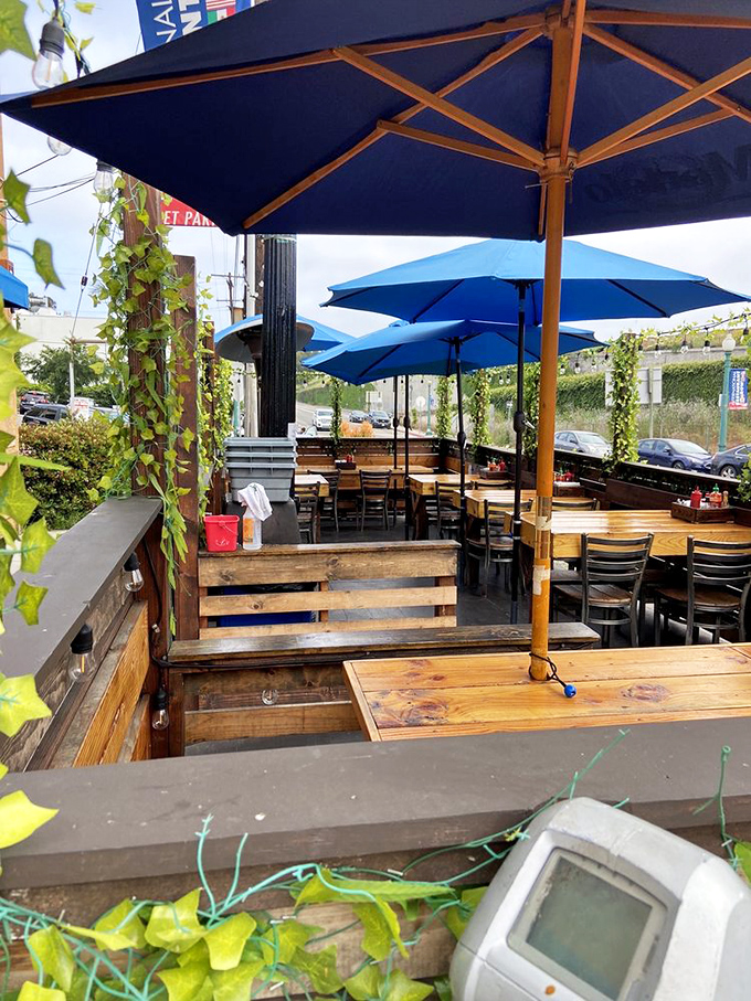 Al fresco dining under blue umbrellas creates the perfect Southern California vibe. Ocean breezes not included, but highly probable.