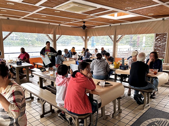 The covered deck at Cantler's—where seafood tastes even better with a side of water views and gentle breezes.