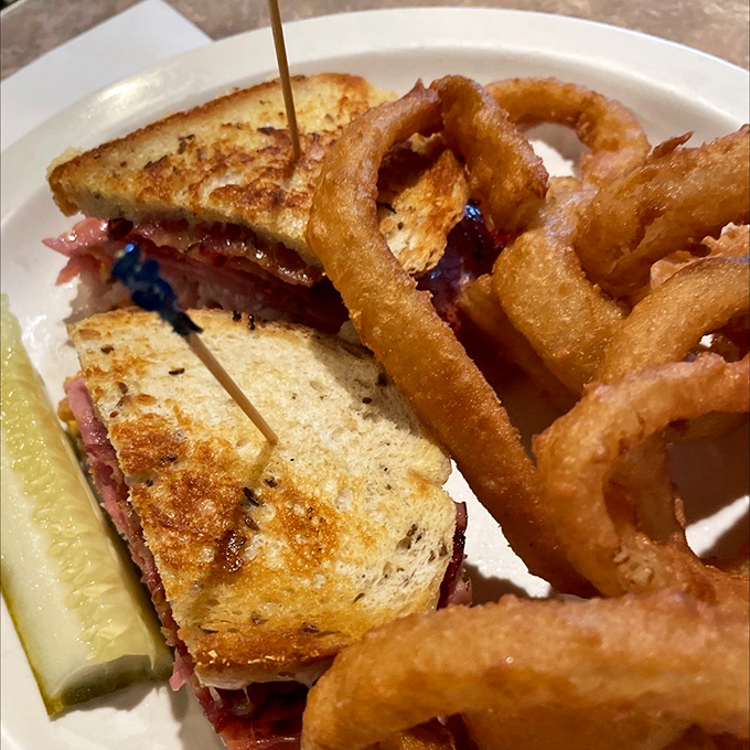 The patty melt and onion rings combo—proof that sometimes the simplest pleasures are the most profound.