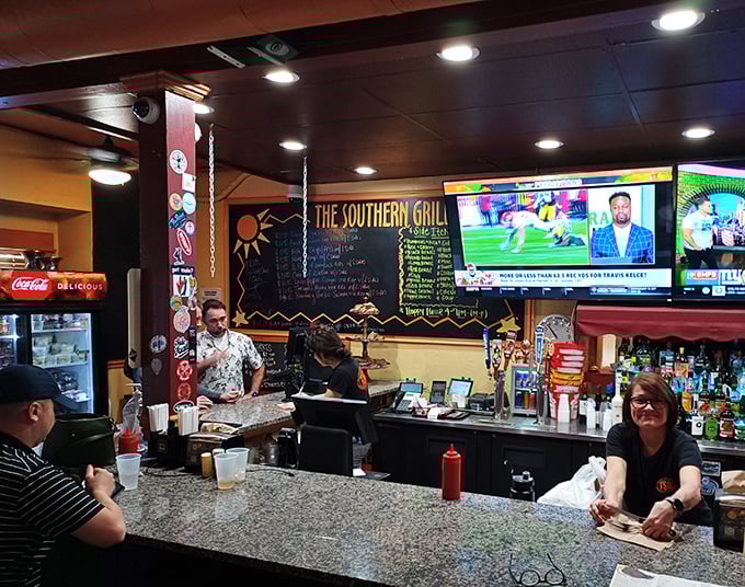 The bar area—where strangers become friends and friends become family over shared plates and sports debates. The true heart of any neighborhood joint.