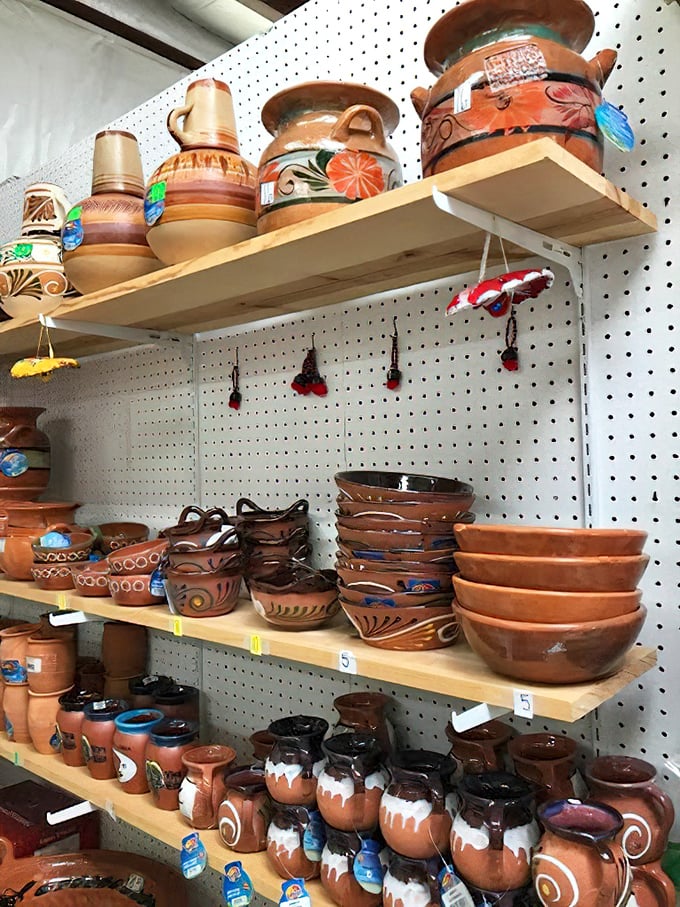 Earthenware poetry in terracotta—these handcrafted pots and bowls carry the warmth of both their clay origins and the meals they'll eventually serve.