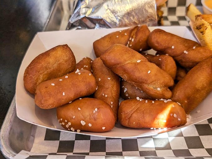 Pretzel bites with a golden-brown exterior that would make any Bavarian proud. Soft, salty perfection waiting for their beer cheese bath.