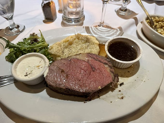 Prime rib cooked to that perfect rosy medium-rare, with jus standing by. This isn't just dinner—it's a celebration on a plate.
