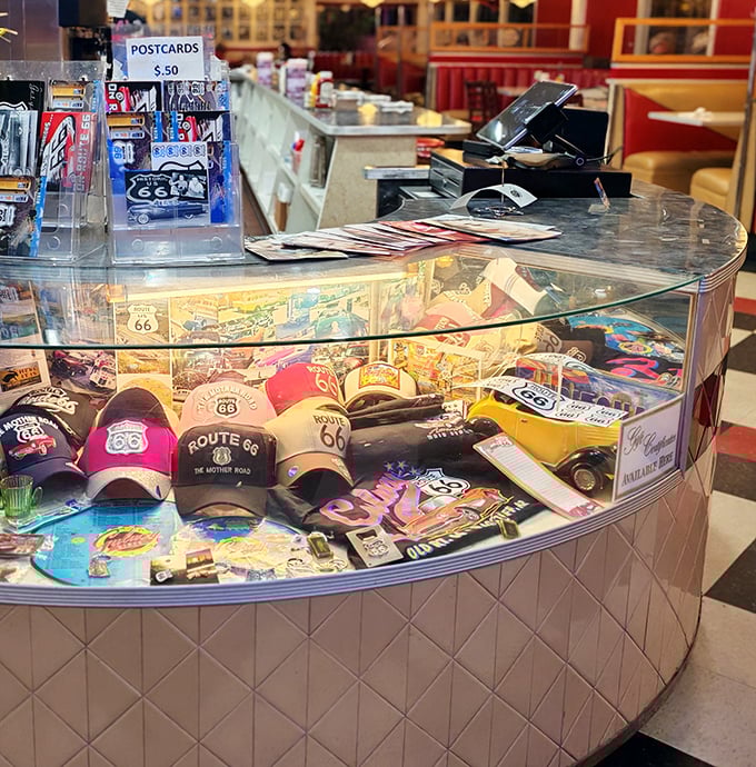 Route 66 memorabilia under glass—because some treasures, like the perfect roadside diner, deserve to be preserved for future generations.