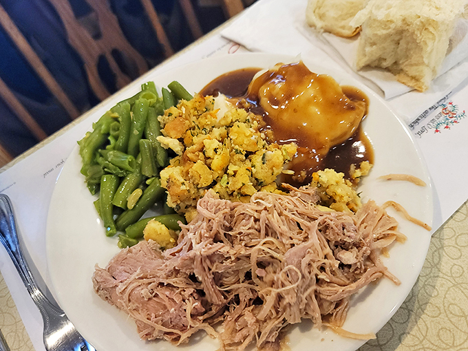 A plate that tells Ohio's story: tender pulled pork, garden-fresh green beans, homestyle stuffing, and gravy that should be classified as a controlled substance.