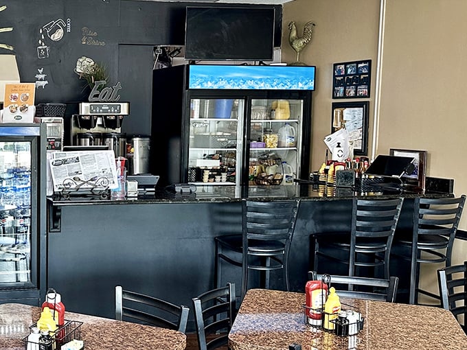 The coffee station and register area—command central for the morning happiness operations that fuel Naples one perfect breakfast at a time.