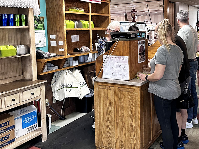 The humble checkout area – last chance to grab a souvenir before your food memories become the stuff of family legend.