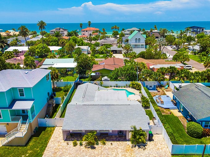 Pastel-colored homes with private pools dot the landscape – modest yet comfortable living spaces just a seashell's throw from the Gulf.