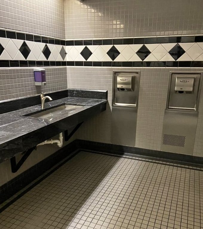 Even the restroom shows attention to detail with its classic black and white tile pattern—because excellence doesn't take bathroom breaks.