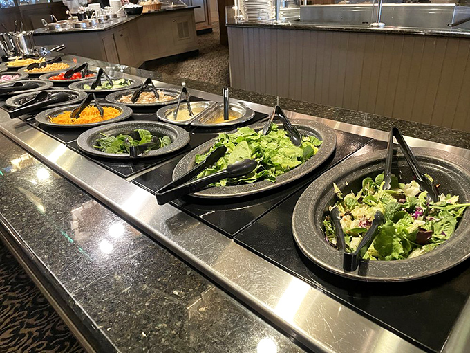 The salad bar – nature's apology for what you're about to do to your body at the carving station. Fresh, colorful, and surprisingly tempting.