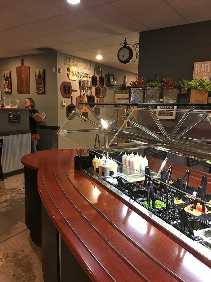 A condiment station that means business. The sign of a place that understands customization is key to happiness—especially when it comes to pizza toppings.