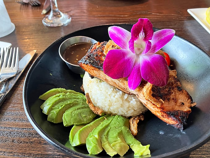 This salmon dish, adorned with an orchid like it's headed to prom, proves that sometimes the best plates are the ones that look too pretty to eat.